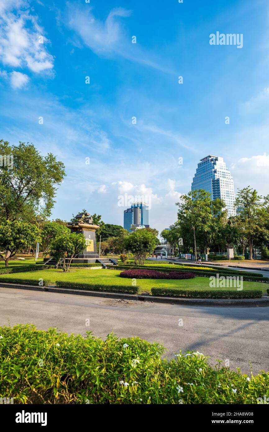 Lumpini park in Bangkok and the skyline of downtown Bangkok central ...