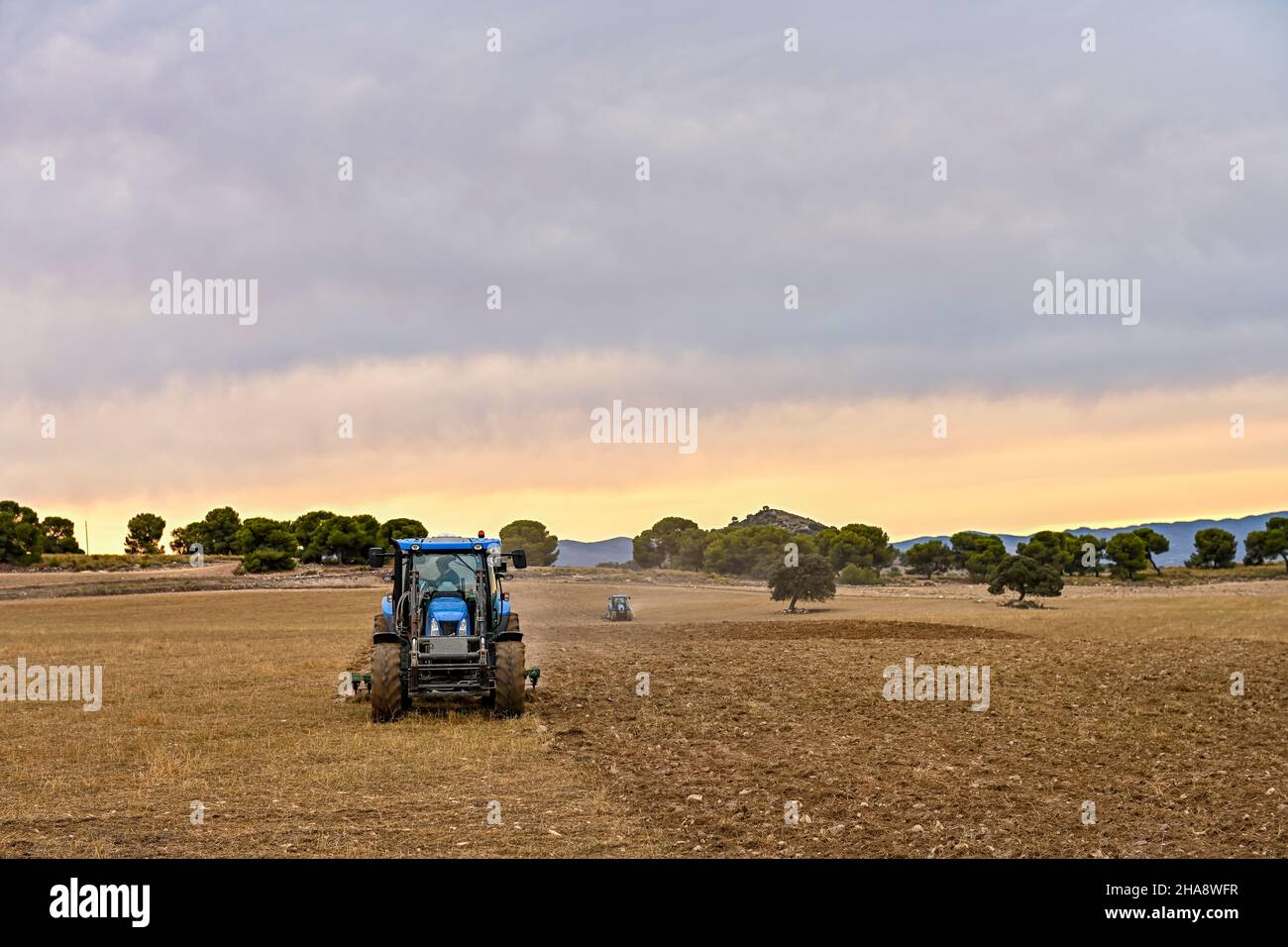 Work in agricultural hi-res stock photography and images - Alamy