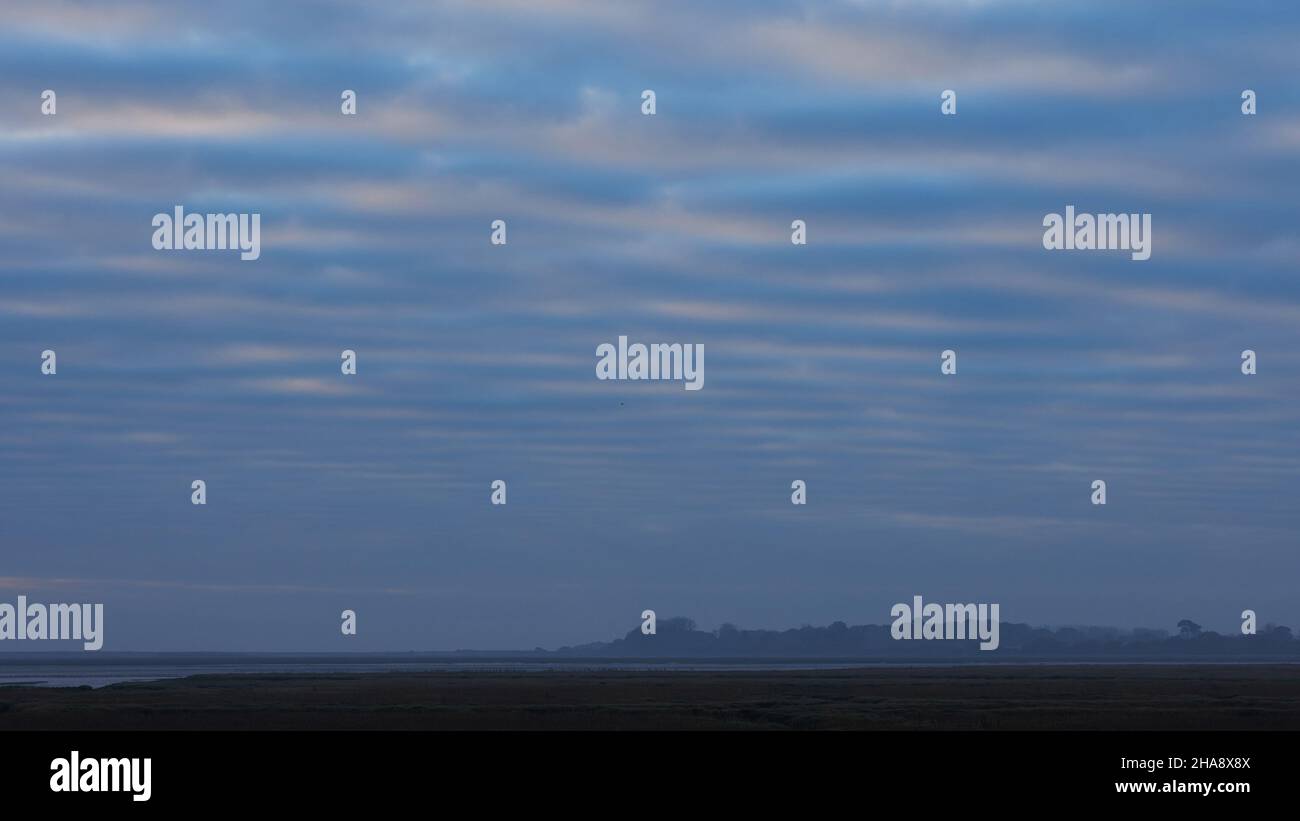 Wide view over Pagham harbour nature reserve in late autumn Stock Photo ...
