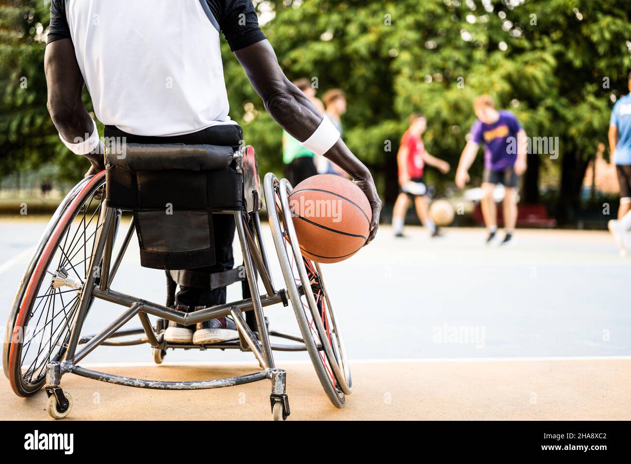 african american basketball player in wheelchair waiting to play on ...