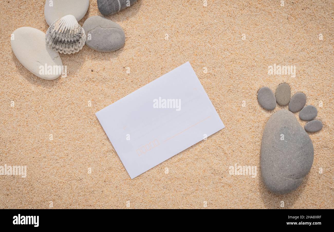 Background grains of sea sand, beach sand with envelope and pebble ...