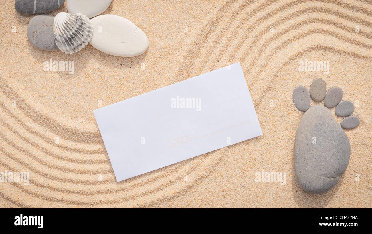 Background grains of sea sand, beach sand with envelope and pebble ...