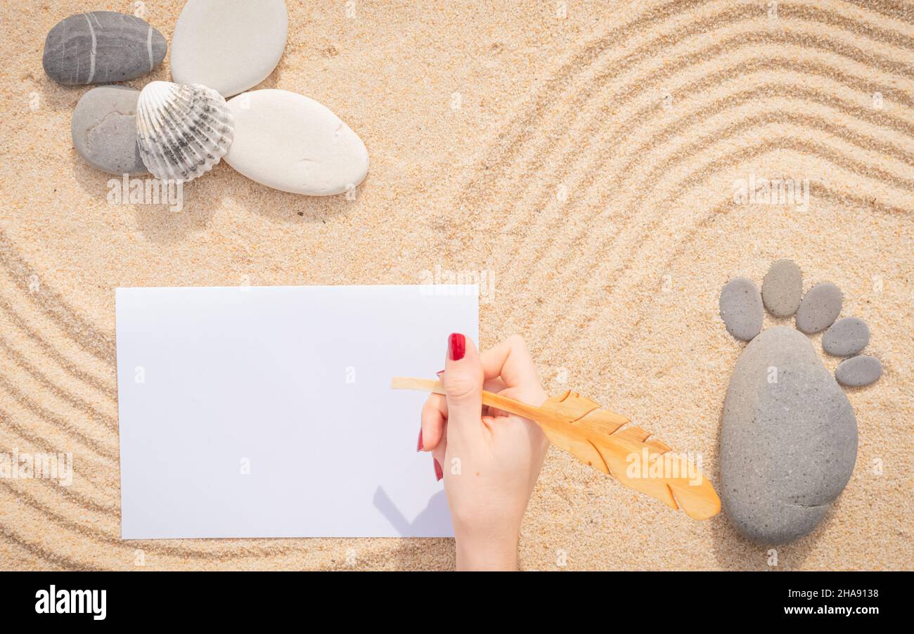 Background grains of sea sand, beach sand with envelope and pebble ...
