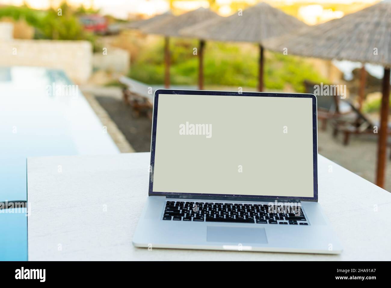 computer on table background as a pool Stock Photo - Alamy