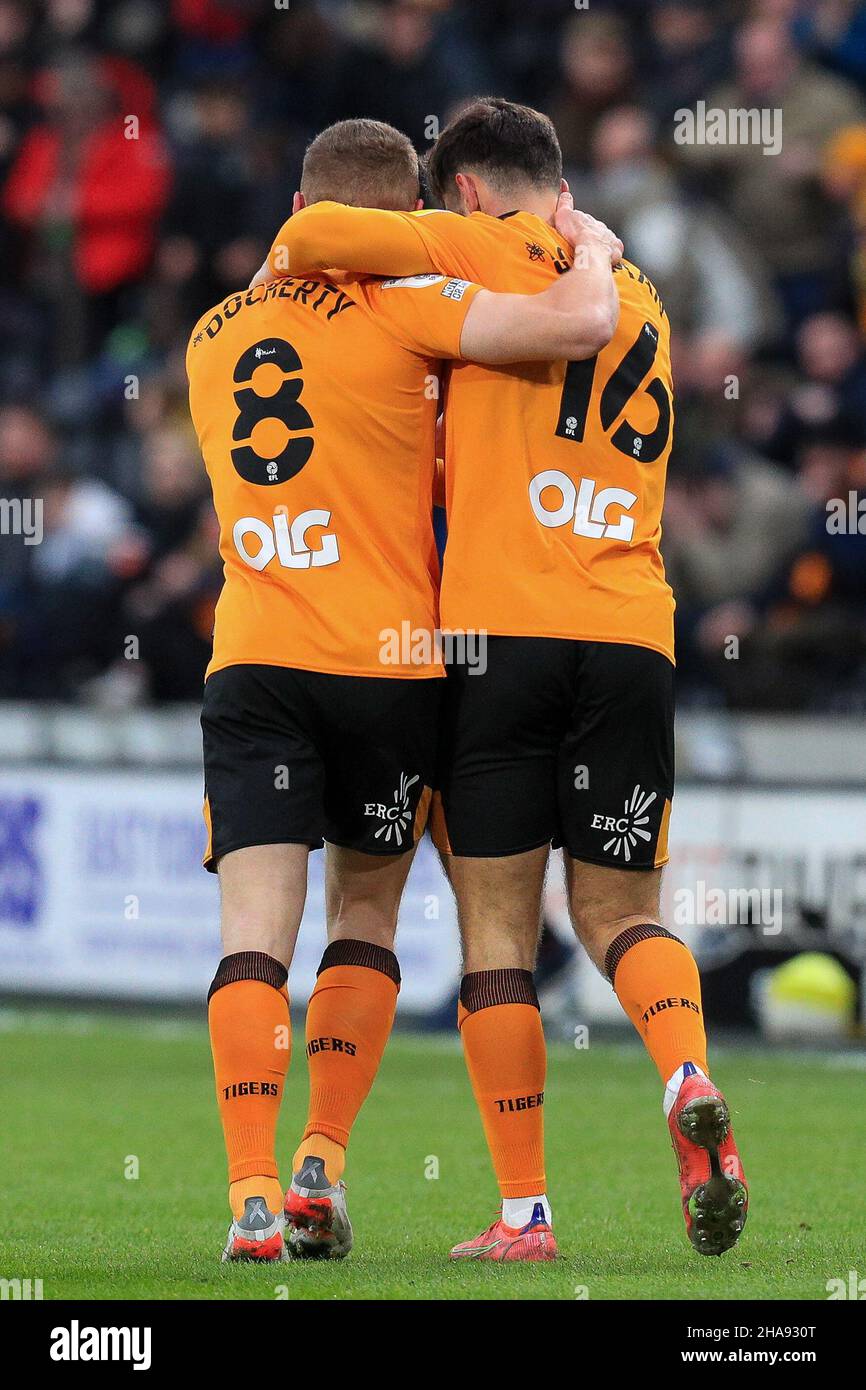 Ryan Longman #16 of Hull City celebrates his goal with Greg Docherty #8 ...