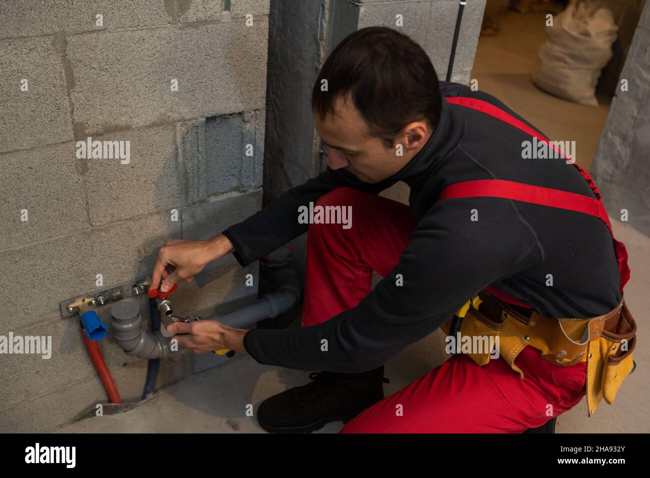 Builder handyman with construction tools. House renovation background ...