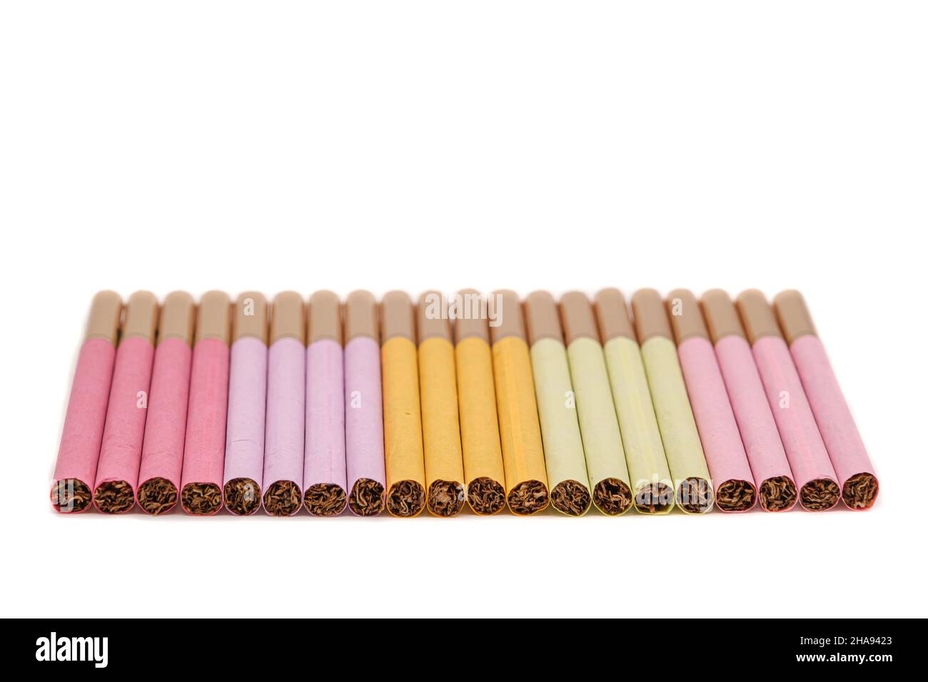 cigarettes of different colors on white background Stock Photo - Alamy