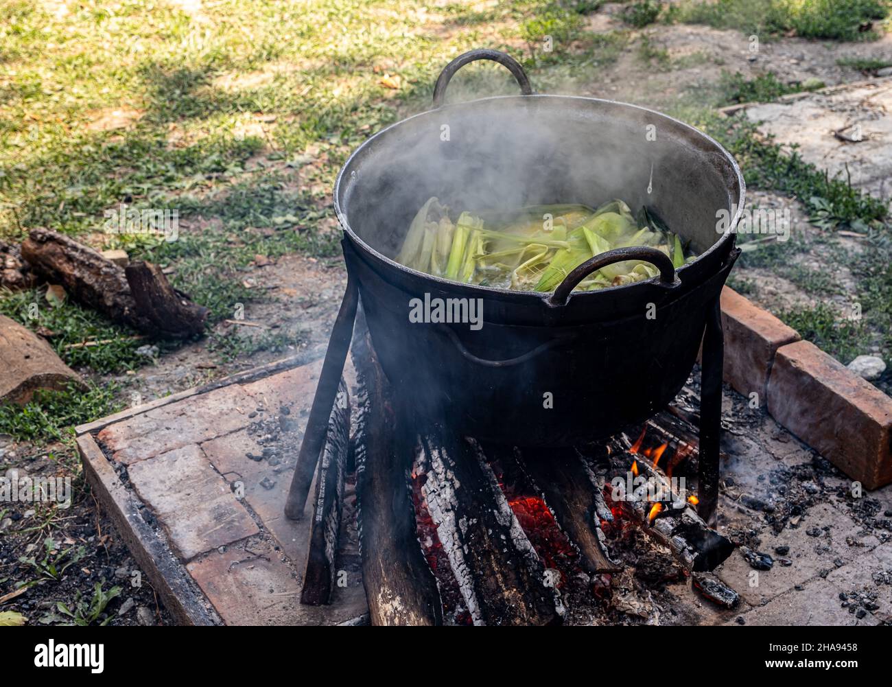 Romanian traditional food prepared at the cauldron on the open fire ...