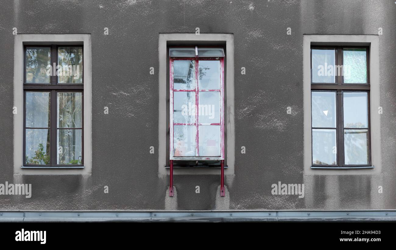 The red box window on the gray facade Stock Photo - Alamy