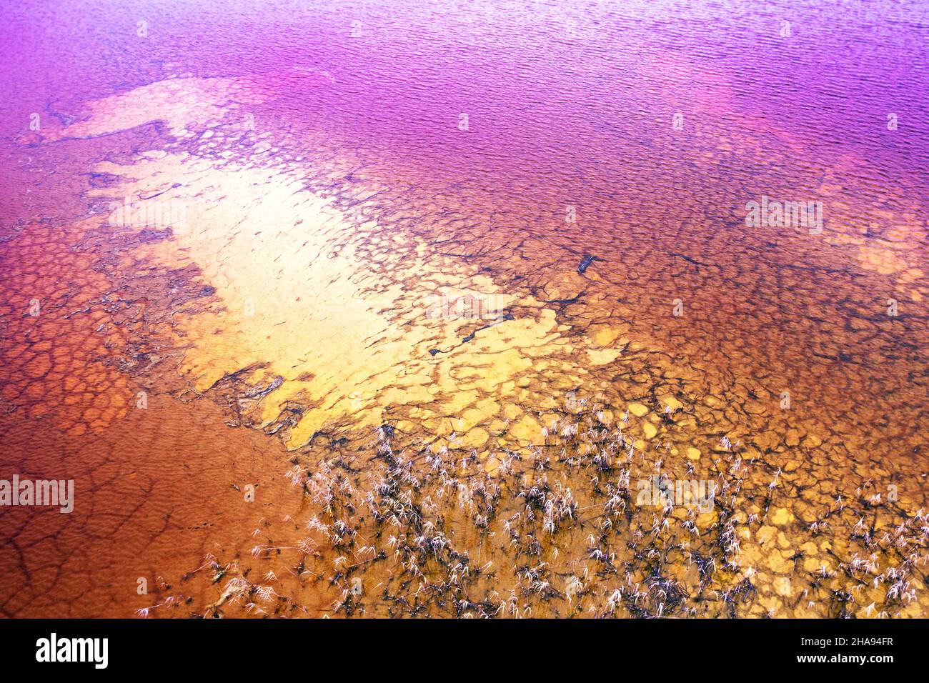 Mining of ores of various metals. Red toxic water in the reservoir of ...
