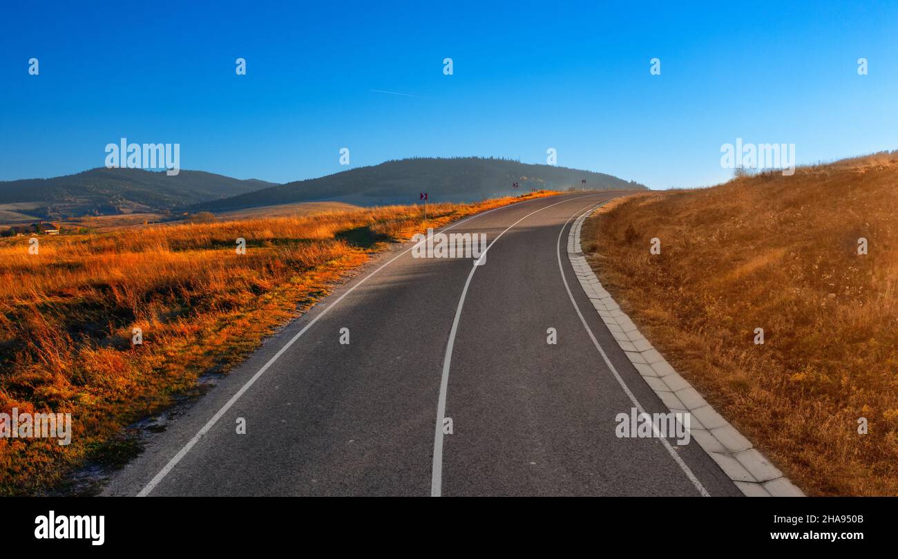High quality asphalt road in the mountains. With markings and road ...