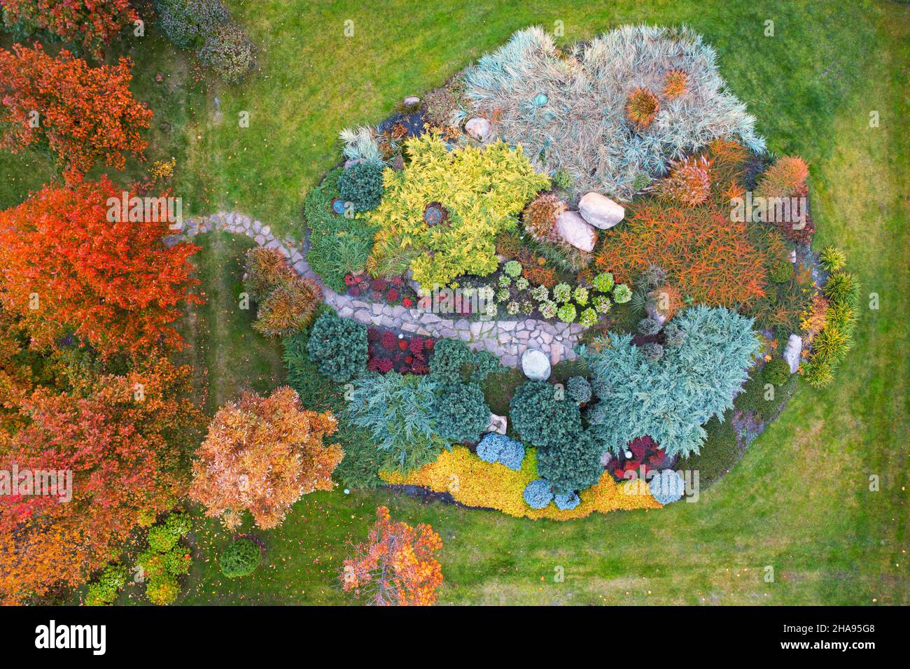 Autumn in the French traditional garden. Many different ornamental ...
