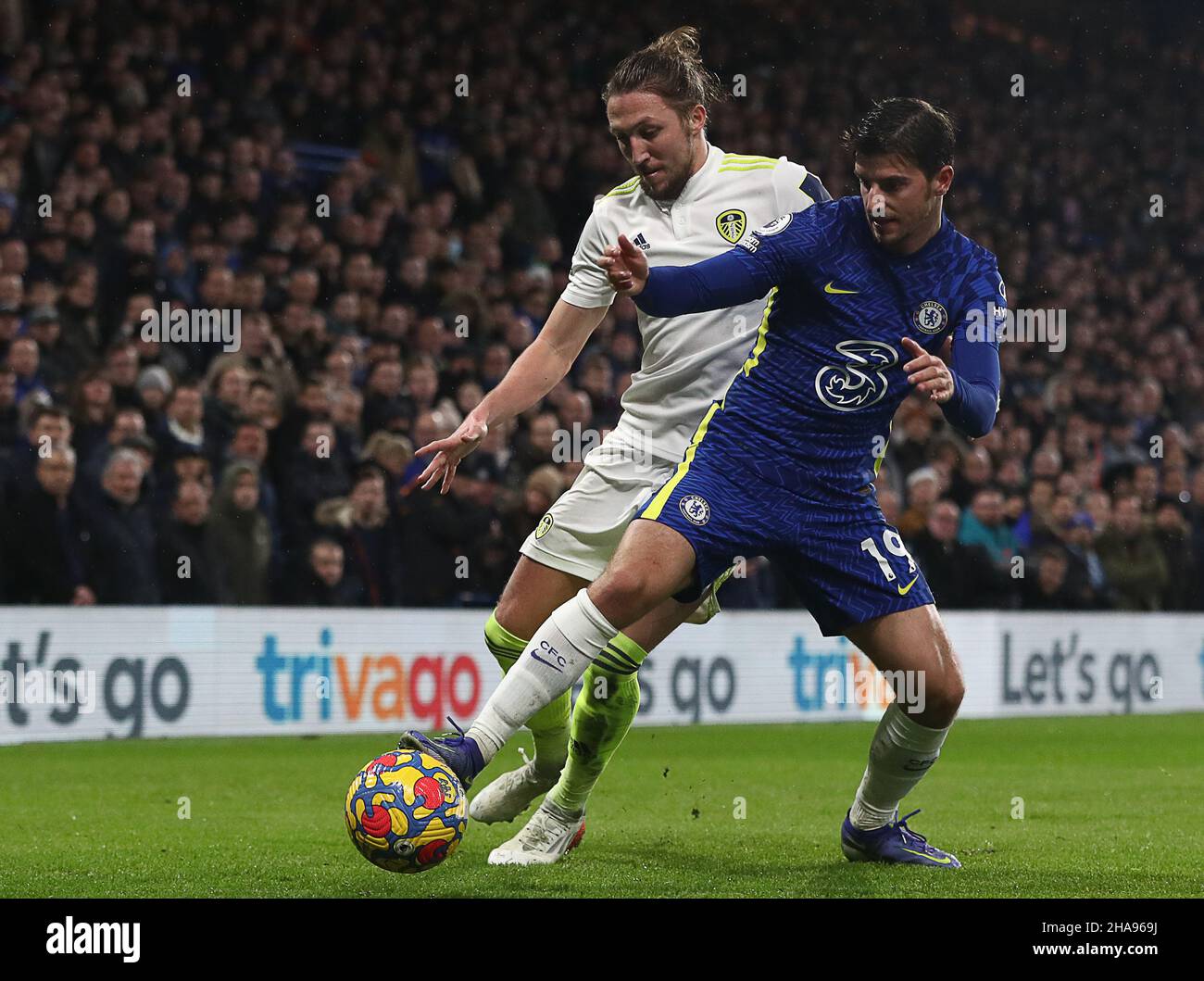 London, England, 11th December 2021. Mason Mount of Chelsea and Luke Ayling of Leeds United ...