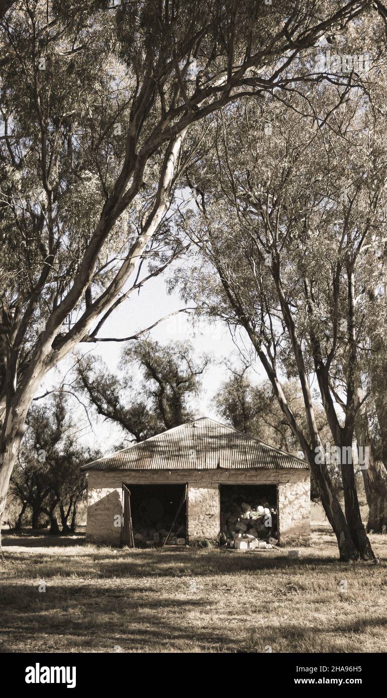 Beautiful view of an old building in the field with trees Stock Photo ...