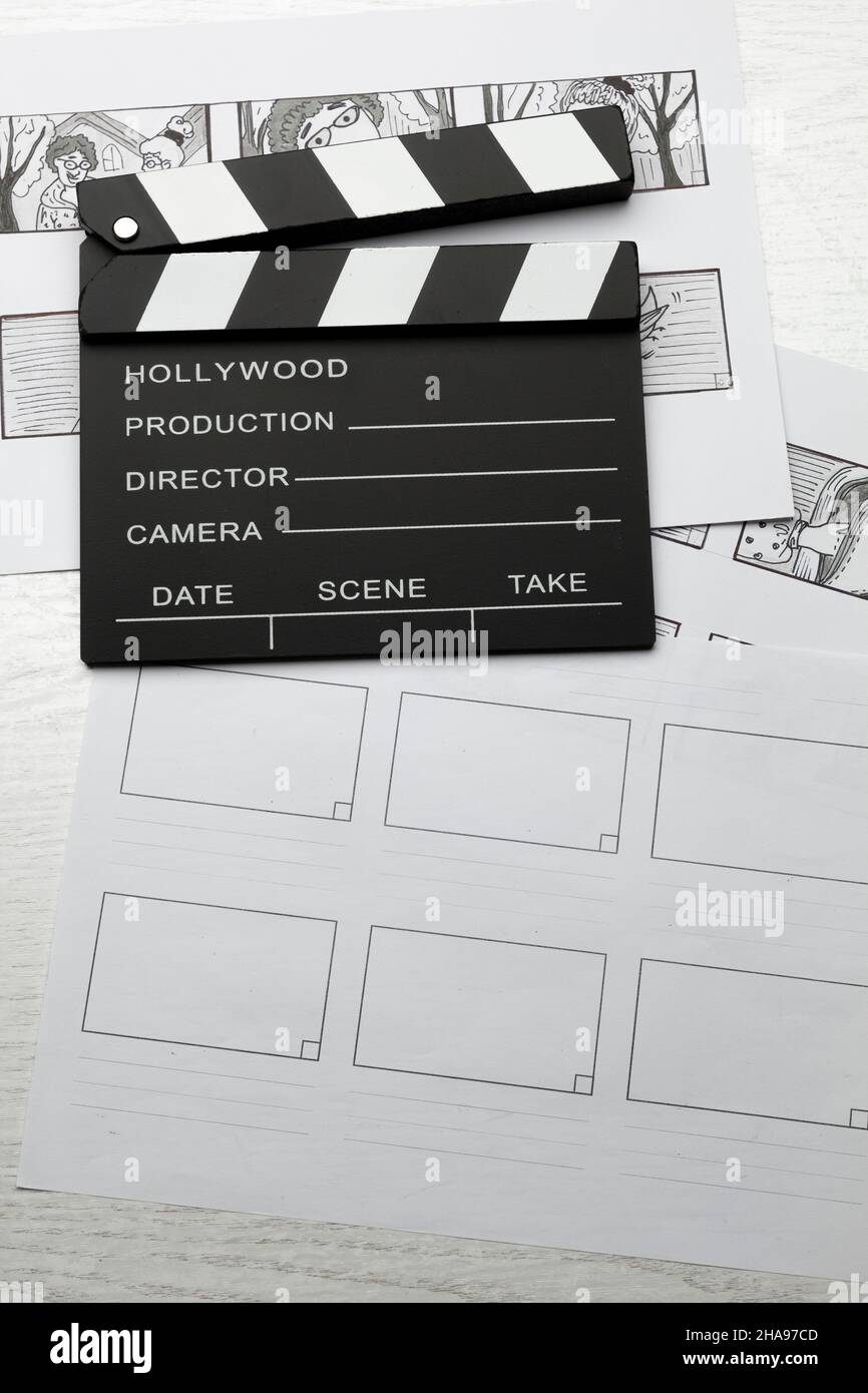 Storyboard and clapperboard on the director's desk. Planned scenes for ...