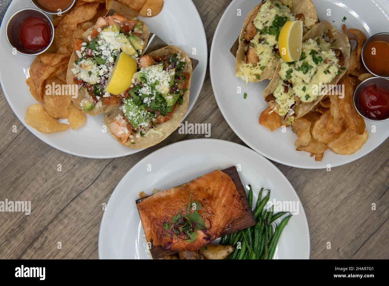 Buffet table of plenty of choices of food dishes to eat, hot off the ...