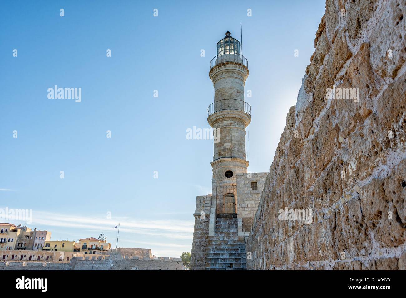 View of lighthouse in venetian harbor in Chania city on Crete island ...