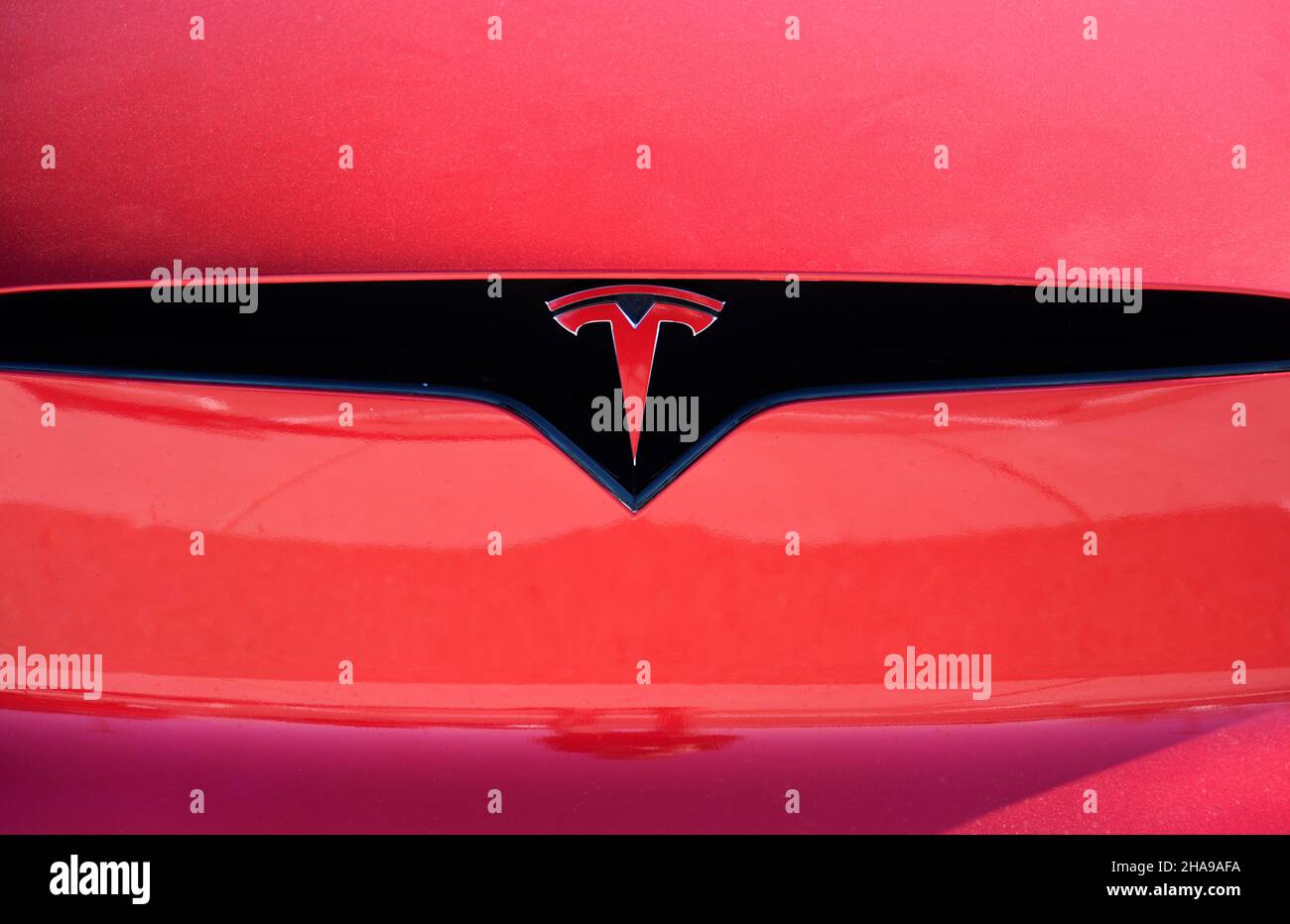 The Tesla logo on the front of a Tesla electric automobile in Santa Fe ...