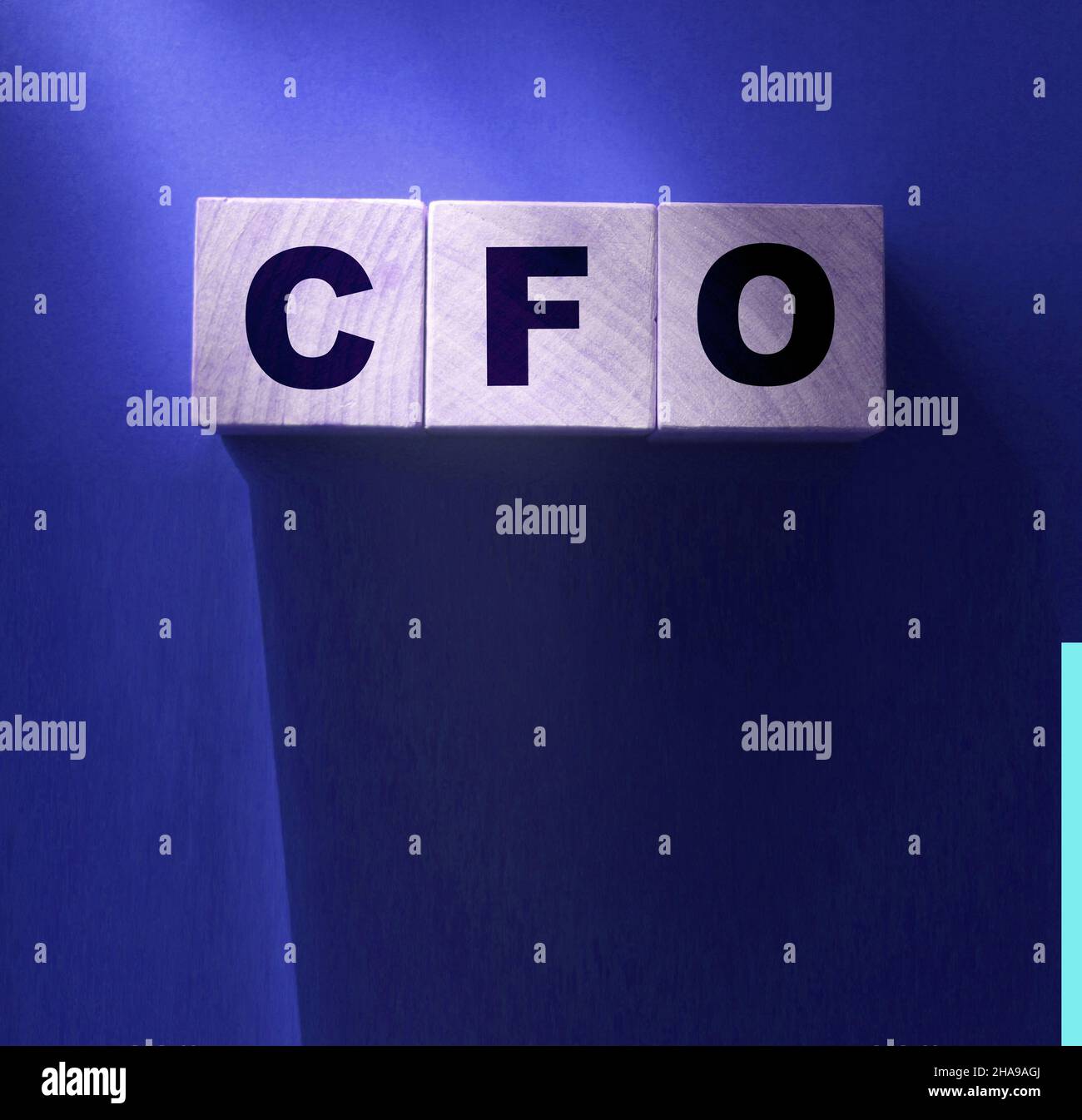 CFO abbreviation on wooden cubes on a red background. Chief Financial ...