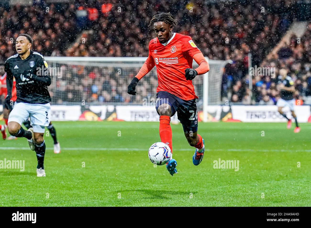 Luton, UK. 27th Nov, 2021. Amari'i Bell (29) of Luton Town (right ...