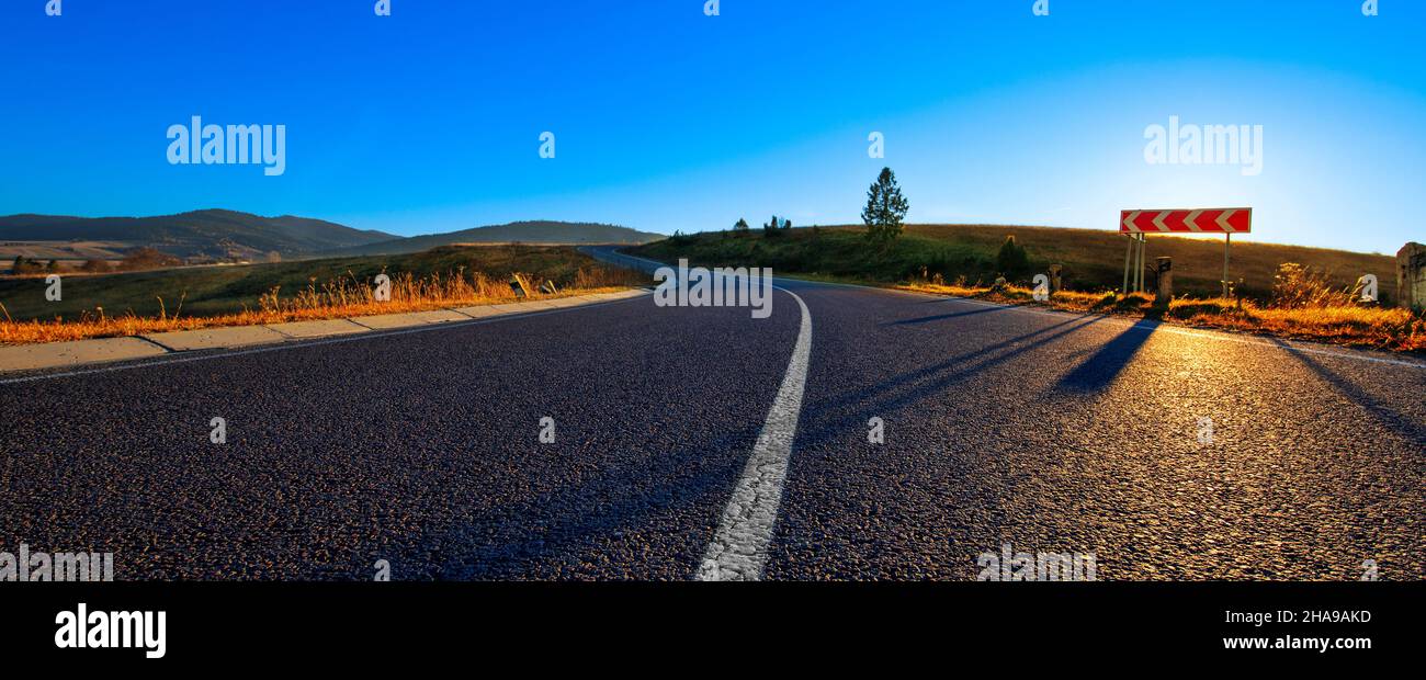 High quality asphalt road in the mountains. With markings and road ...