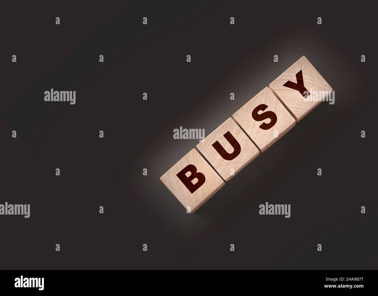 Word Busy made with cube wooden blocks. Business career concept Stock ...