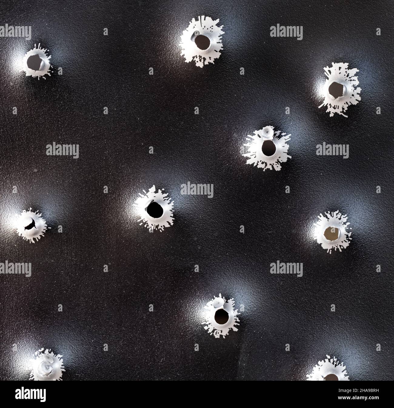 Bullet holes in metal. Concept, use of firearms. Close-up, selective ...
