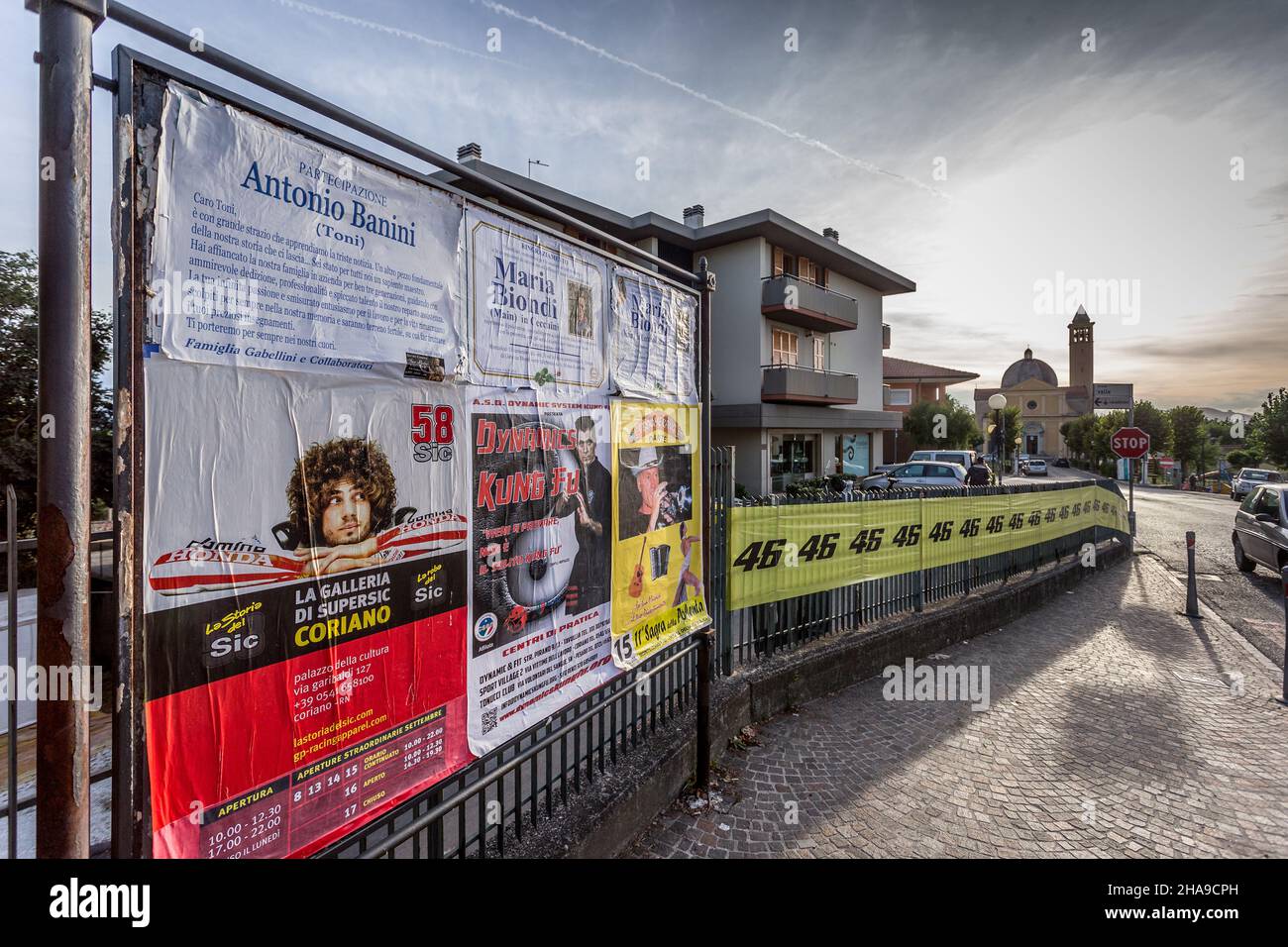 TAVULLIA, ITALY - Sep 18, 2013: A wall with posters commemorating the ...