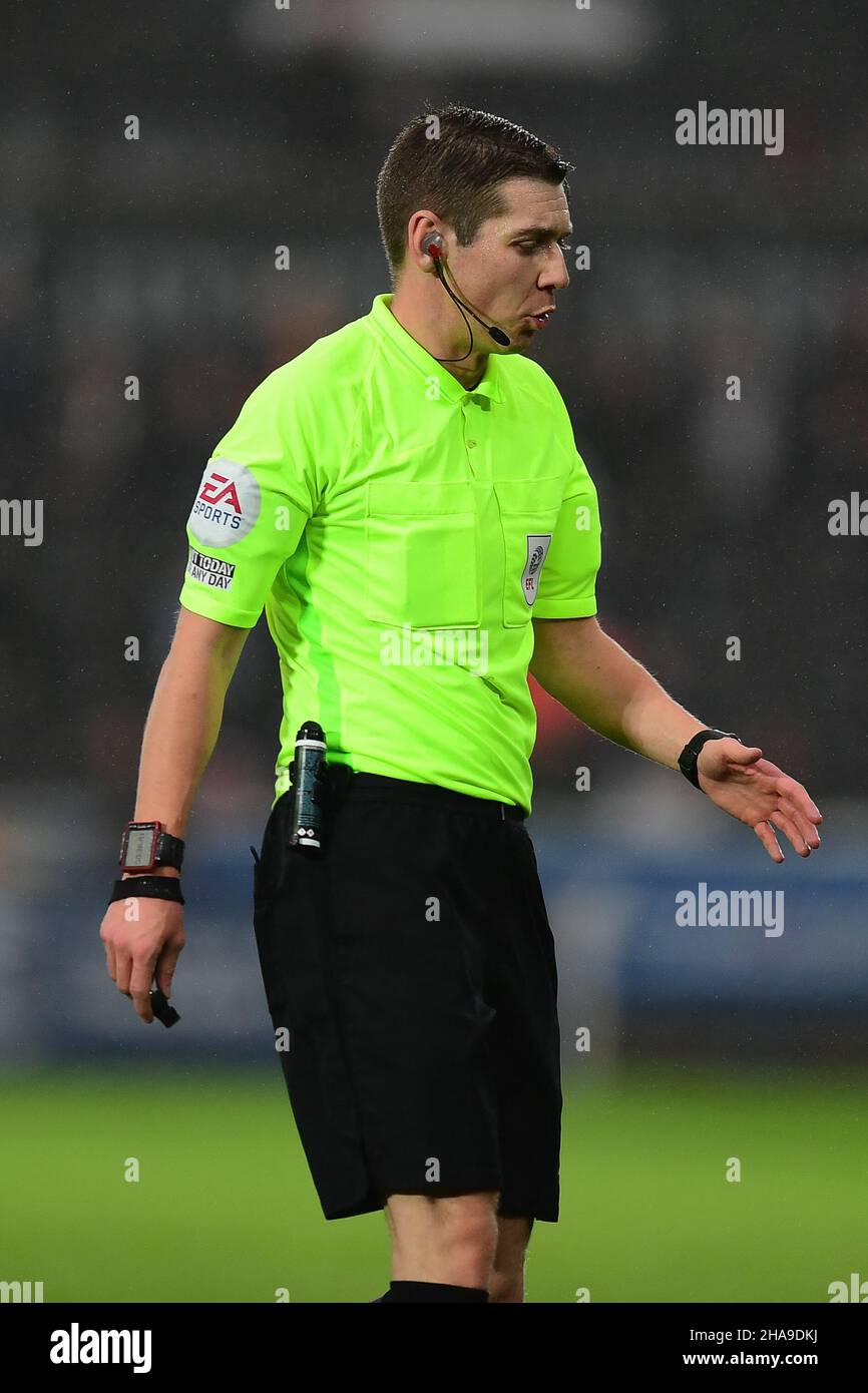 Swansea, UK. 11th Dec, 2021. Referee Matthew Donohue during the game in ...