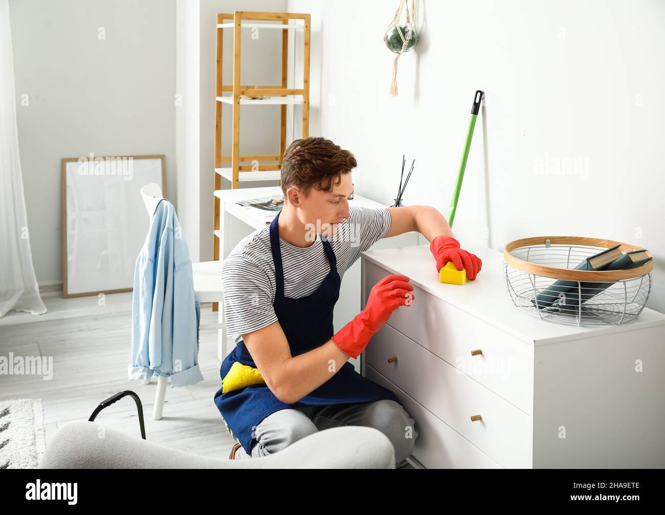 Young man cleaning chest hi-res stock photography and images - Alamy