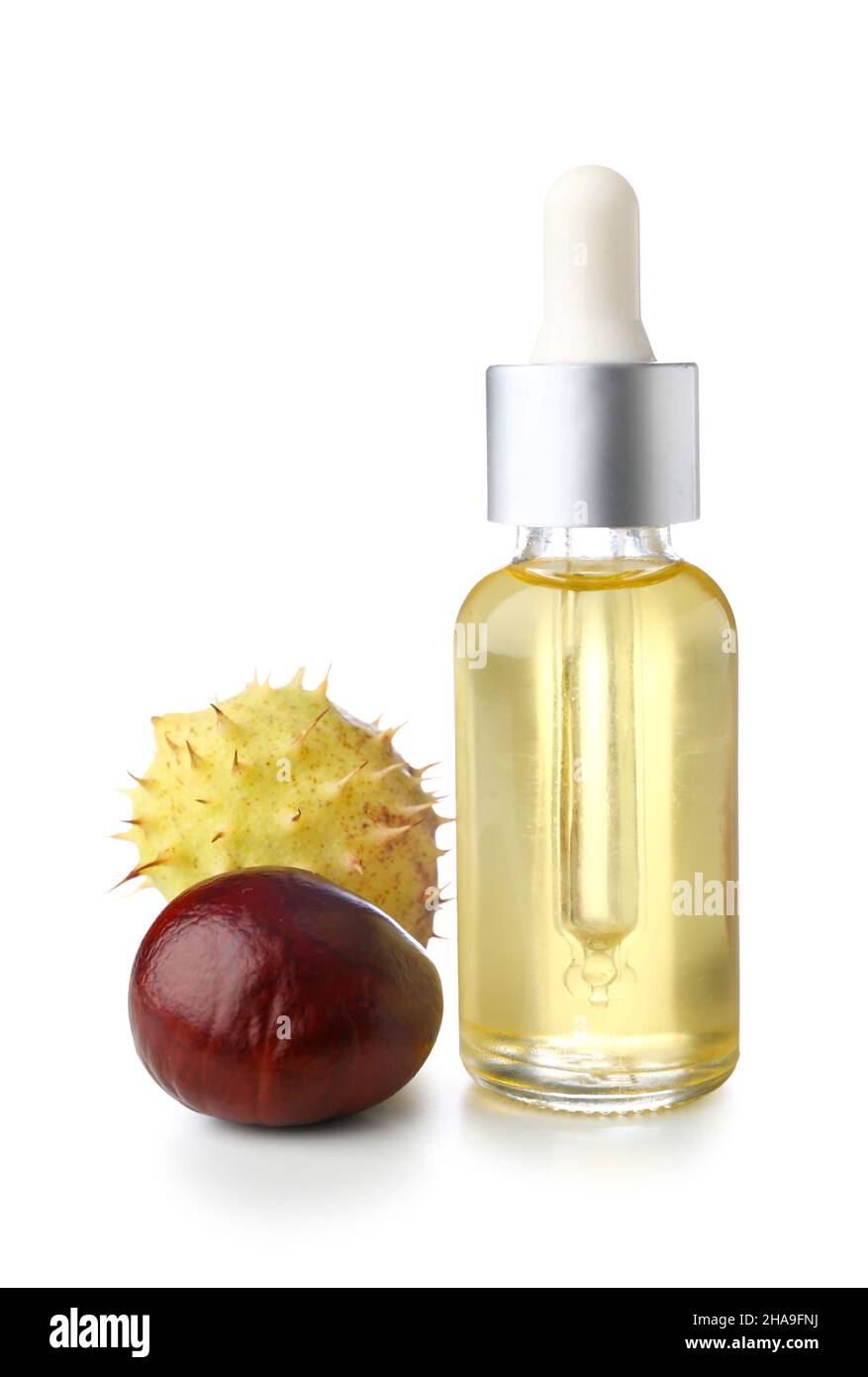 Bottle of organic chestnut oil on white background Stock Photo - Alamy
