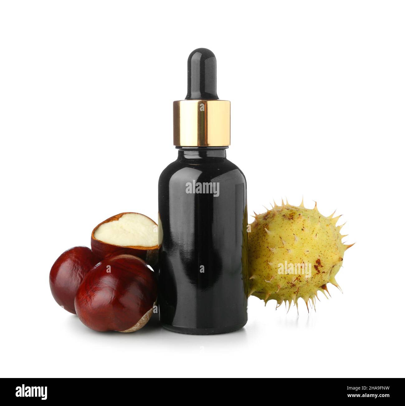 Bottle of chestnut essential oil on white background Stock Photo - Alamy