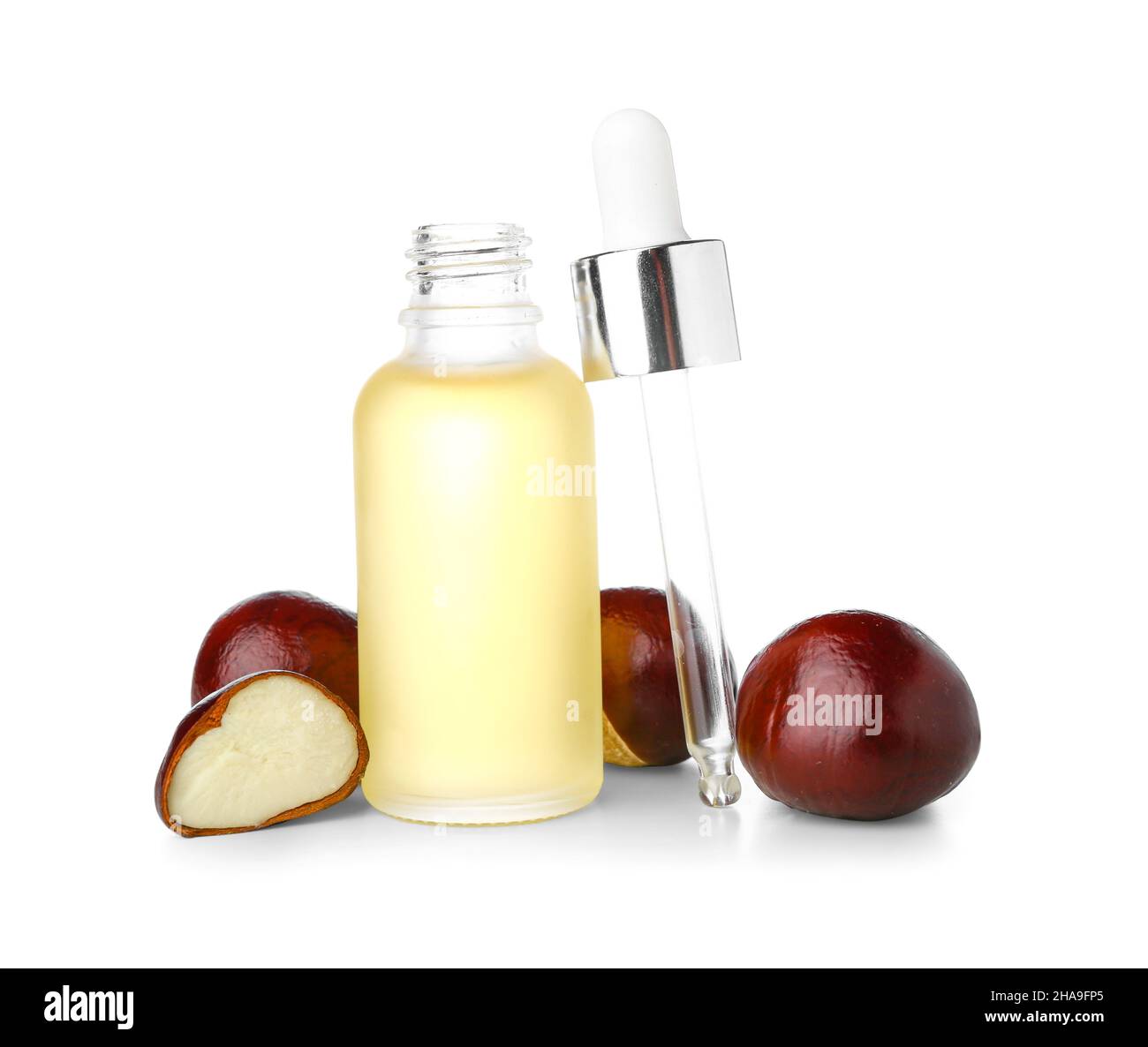 Bottle with chestnut essential oil on white background Stock Photo - Alamy