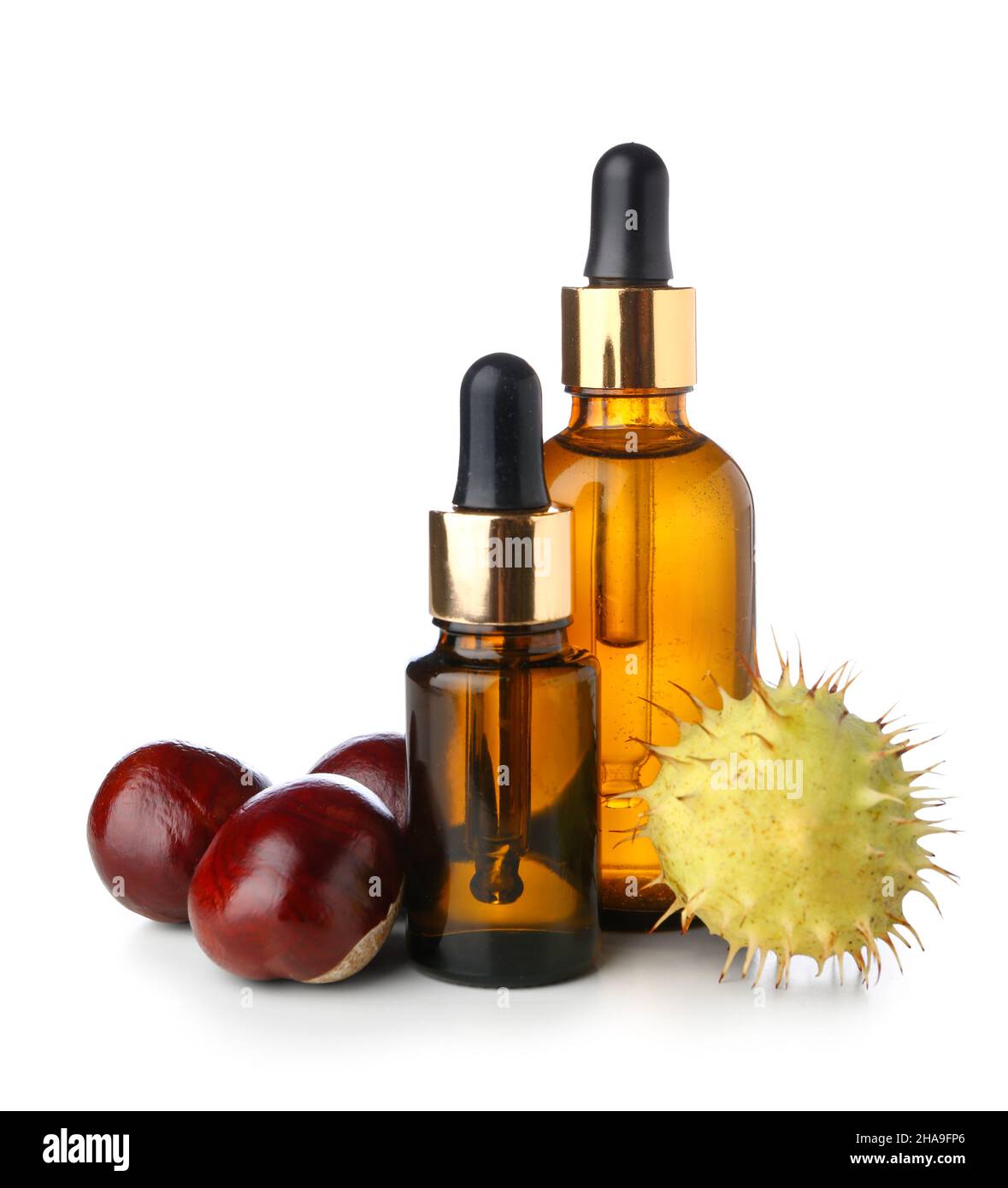 Bottles of chestnut essential oil on white background Stock Photo - Alamy