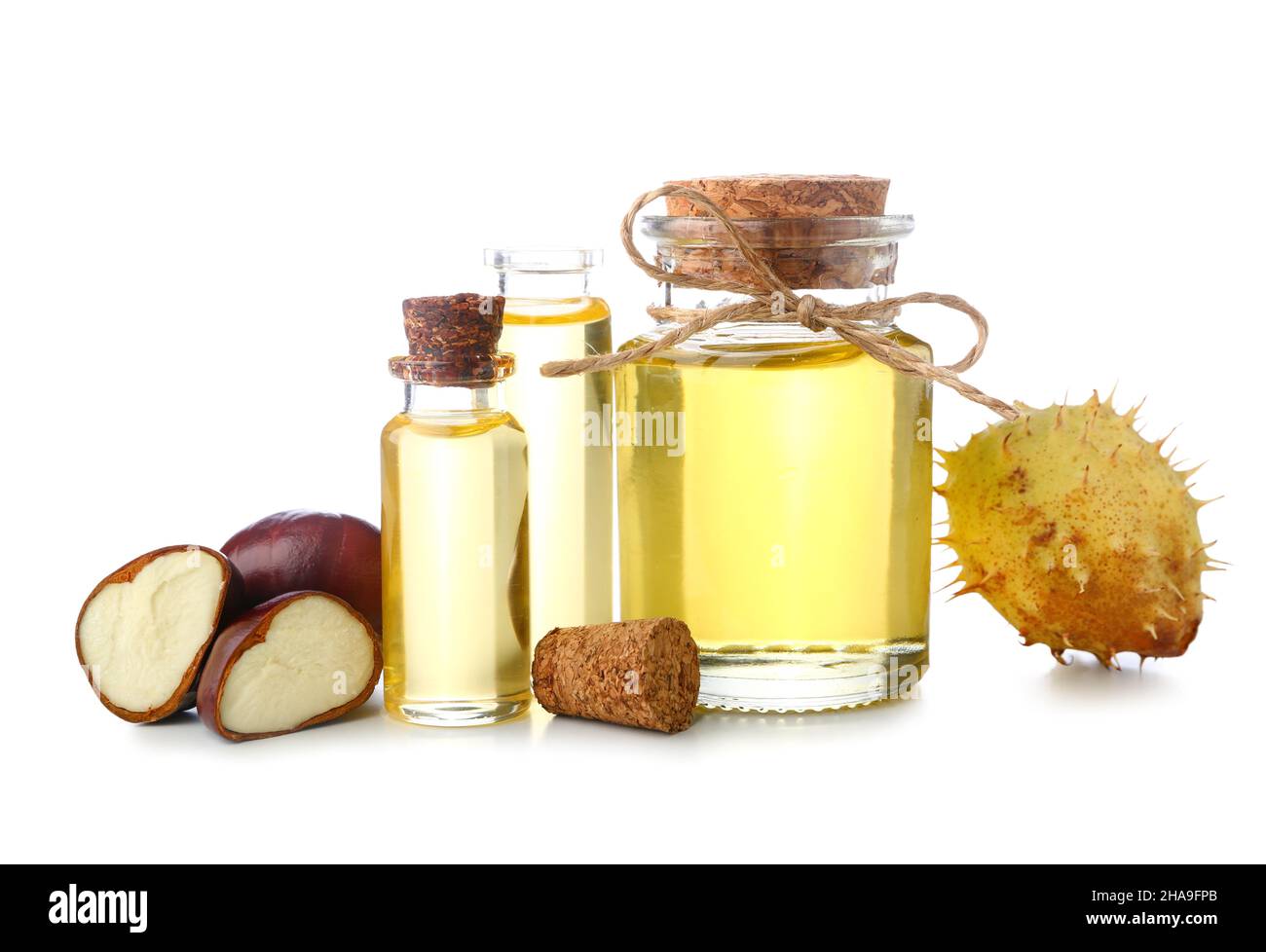 Different bottles of chestnut essential oil on white background Stock ...