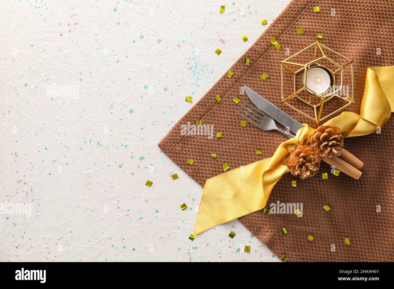 Beautiful cutlery with Christmas decor on light background Stock Photo ...