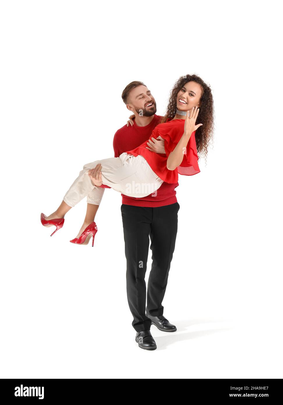 Happy engaged couple on white background Stock Photo - Alamy