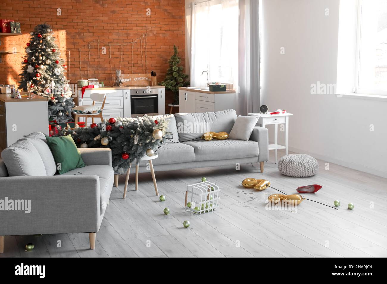 Interior of messy room after Christmas party Stock Photo - Alamy