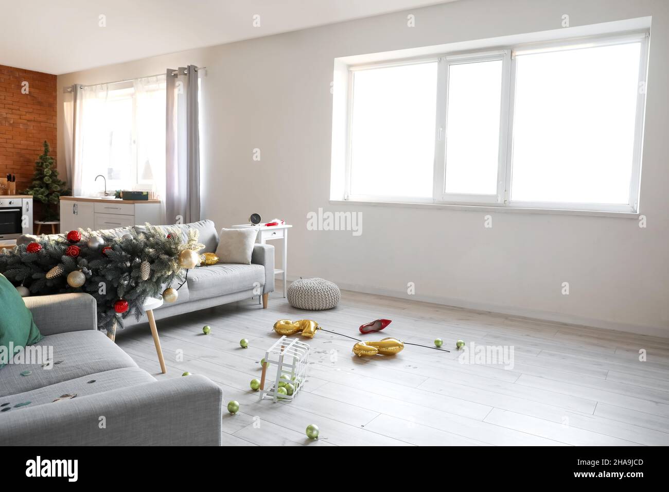 Interior of messy room after Christmas party Stock Photo - Alamy