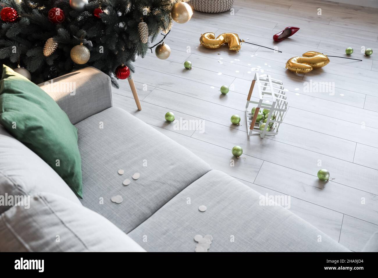 Interior of messy room after Christmas party Stock Photo - Alamy
