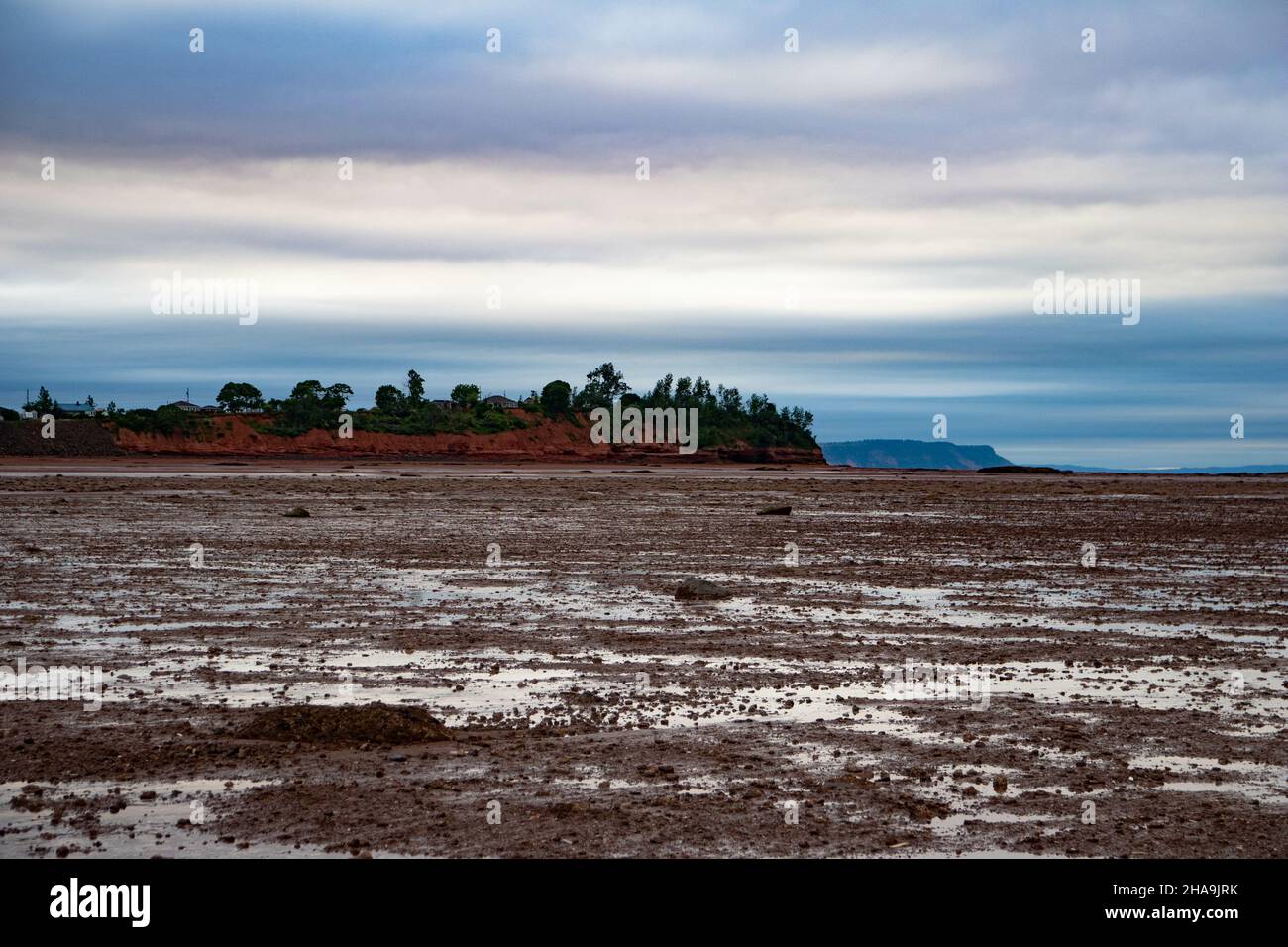 Beautiful empty rocky seashore near cliffs and stone formations with ...