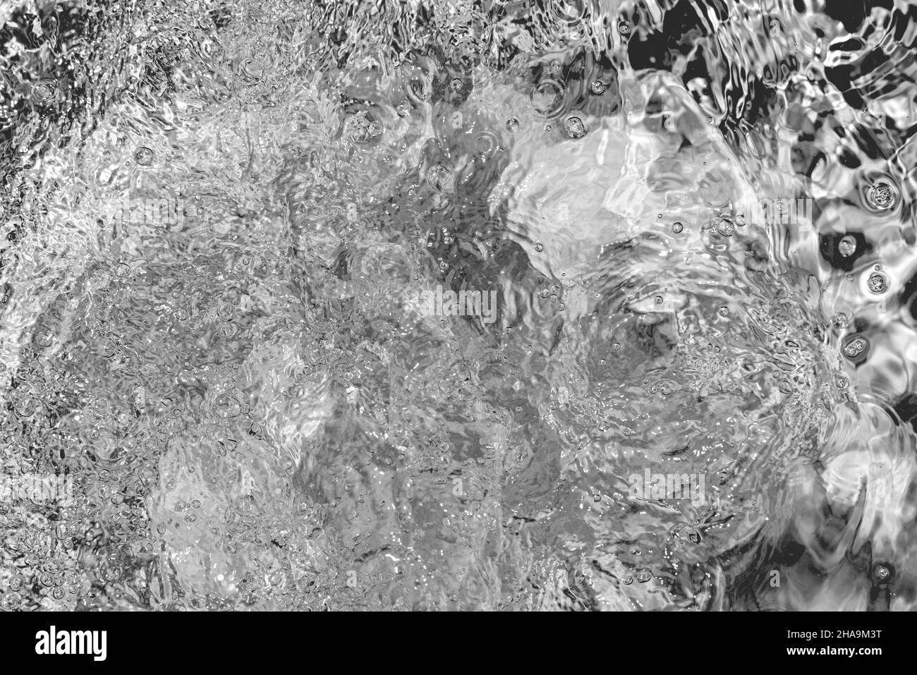 Water drops caustics on surface hi-res stock photography and images - Alamy