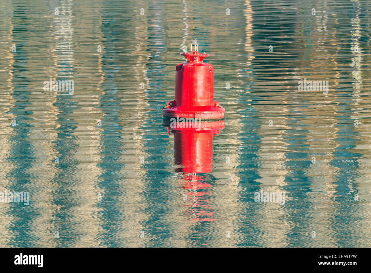 Floating red navigational buoy on water surface of the river Stock ...
