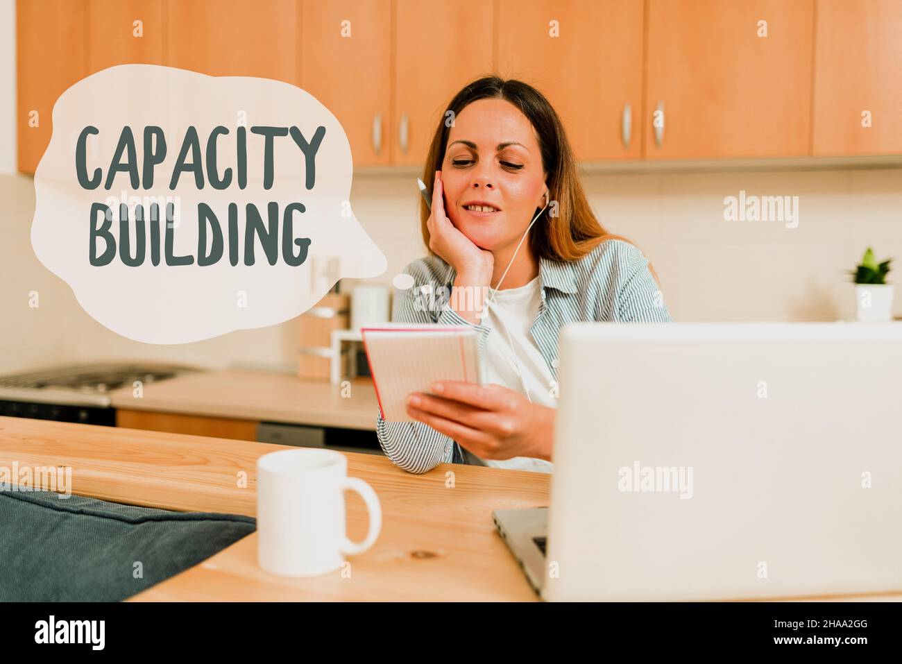 Handwriting text Capacity Building. Concept meaning Strengthen the ...