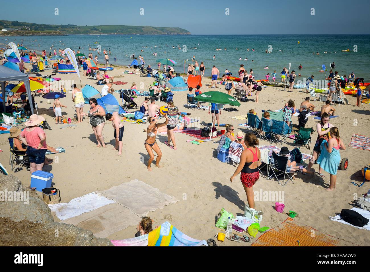 Clonea Strand, County Waterford, Ireland, packed with people on a hot ...