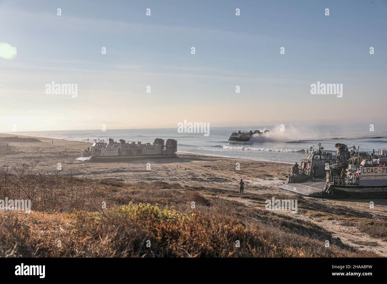 U.S. Navy Landing Craft, Air Cushions (LCAC) transport U.S. Marine ...
