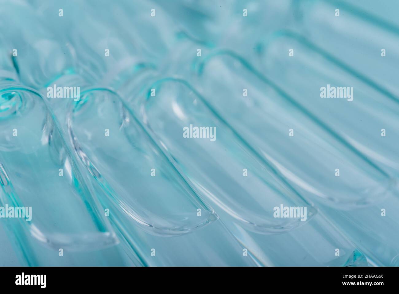 Glass medical ampoule vial for injection. Medicine is liquid sodium ...