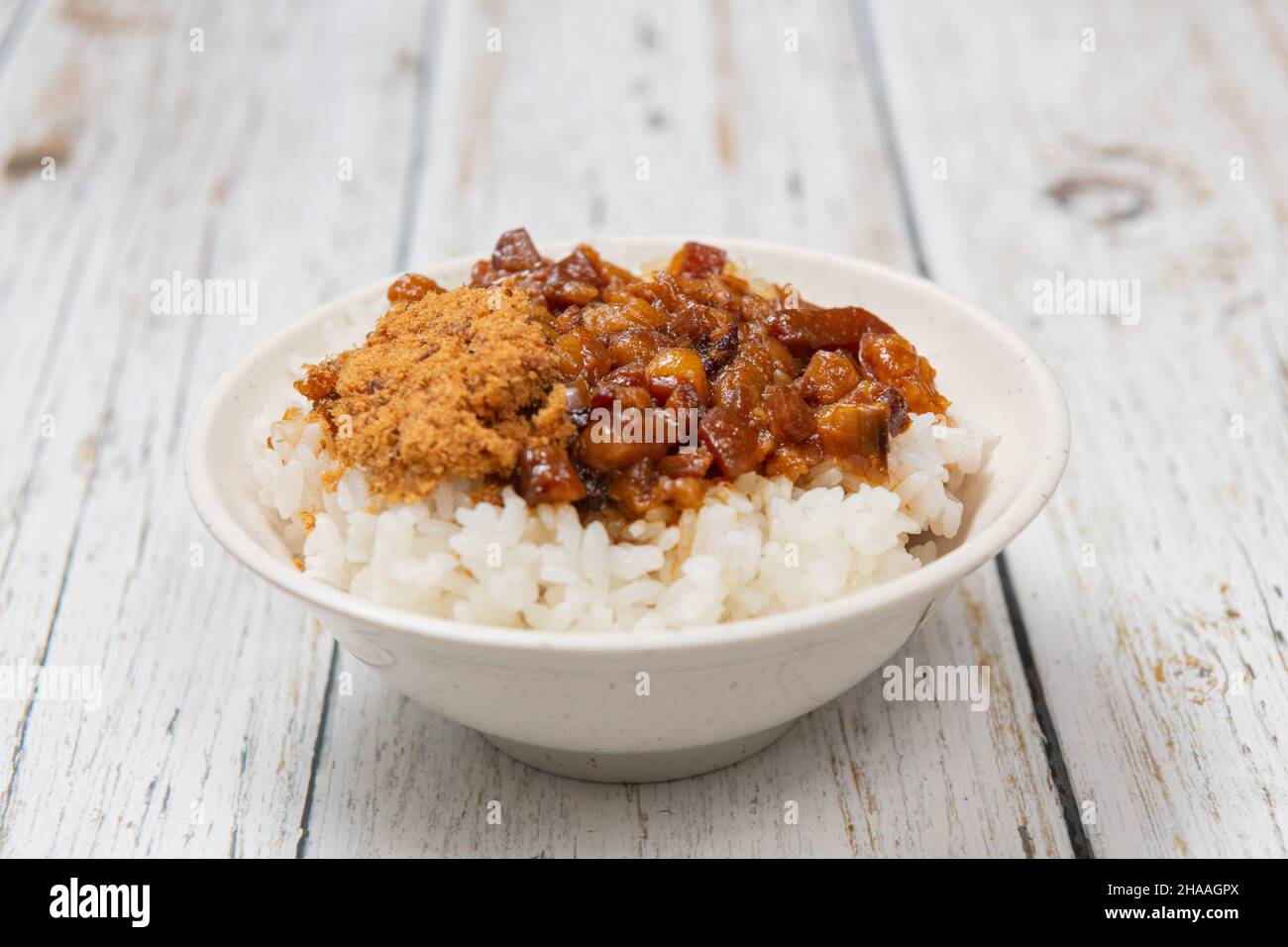 braised pork on rice is Minced pork served with pickles on top of ...
