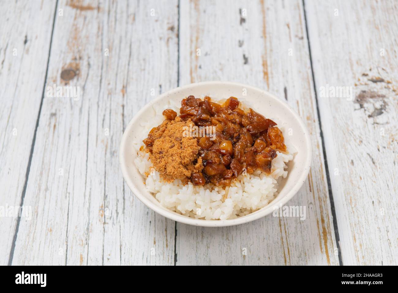 braised pork on rice is Minced pork served with pickles on top of ...