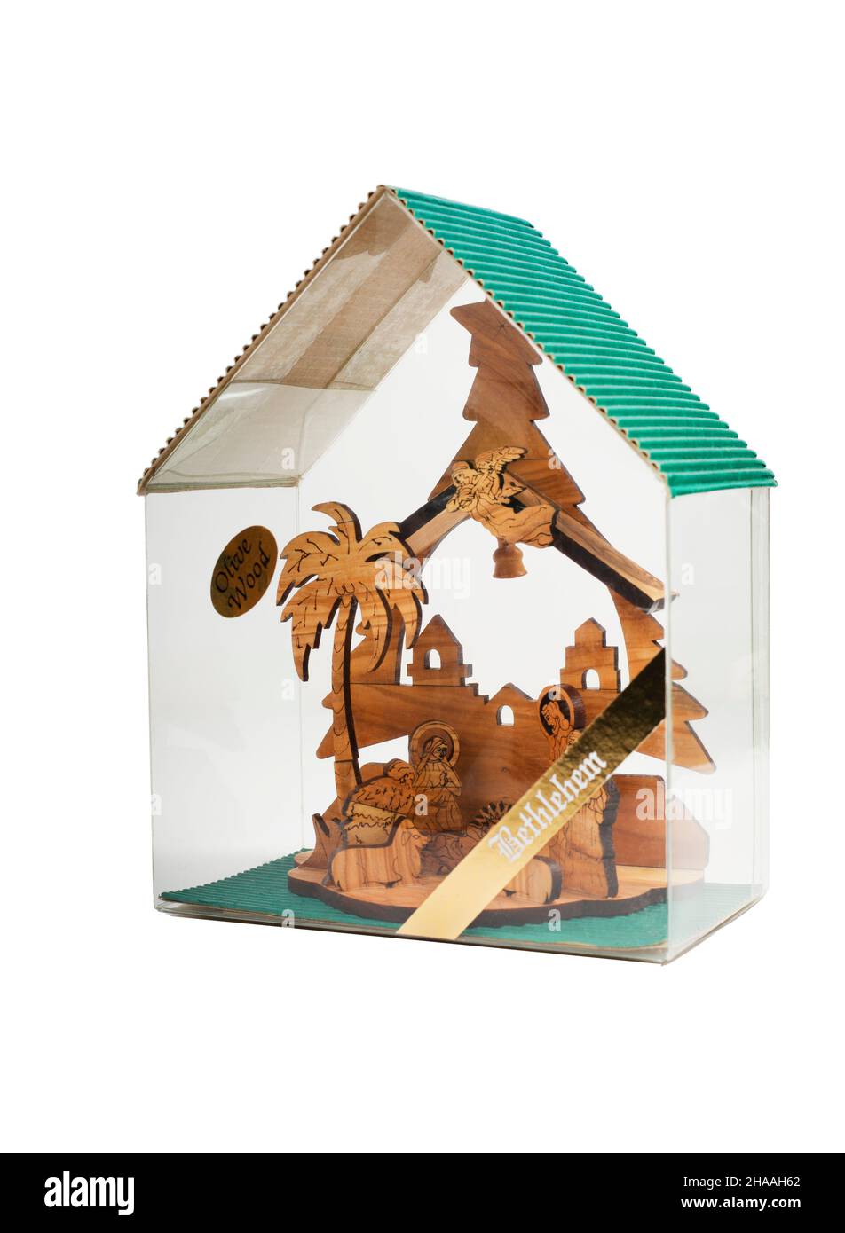 Carved wooden Nativity scene with Jesus in box isolated on white ...